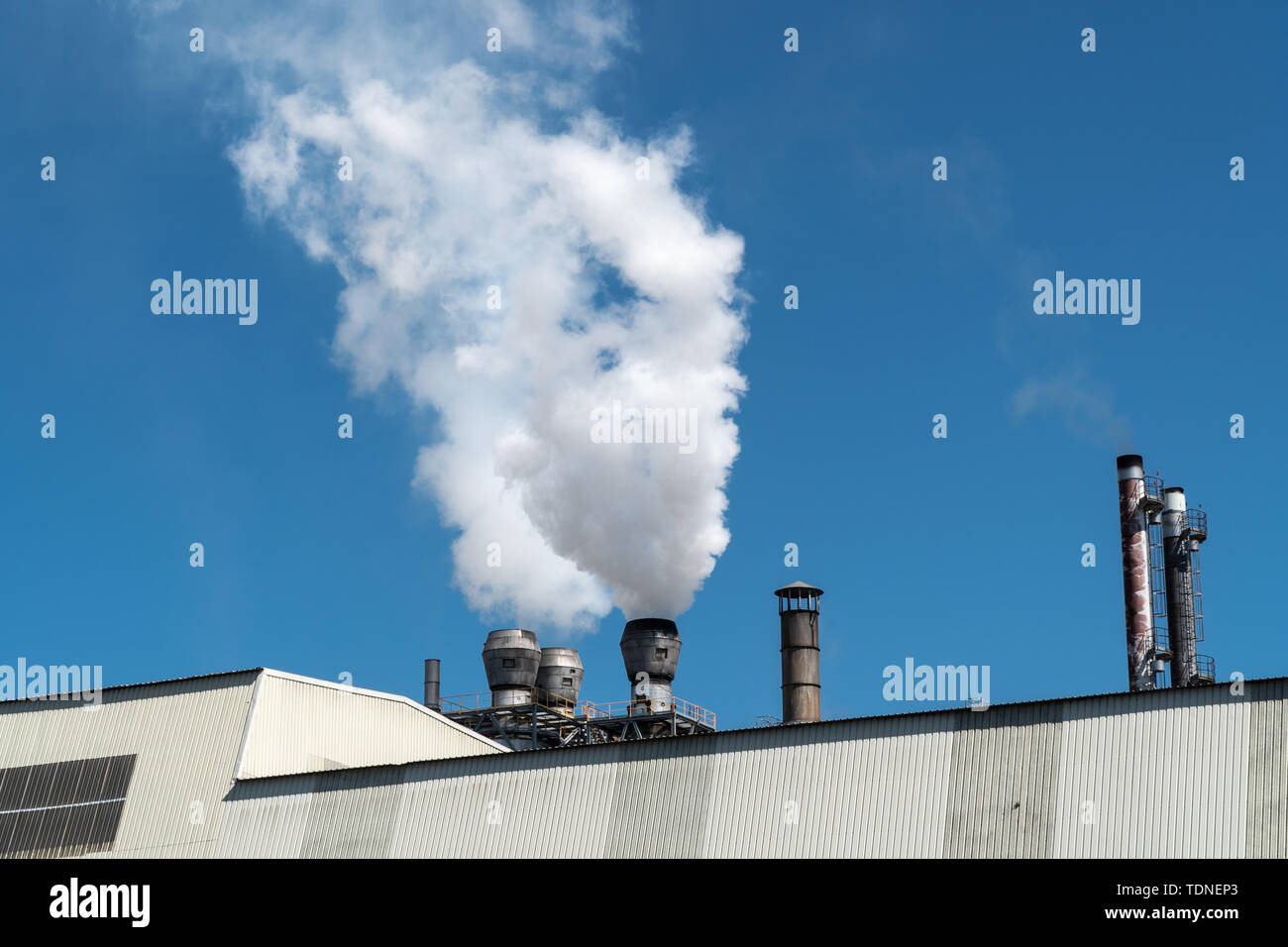 Smoke from pipes on factory hi-res stock photography and images - Alamy