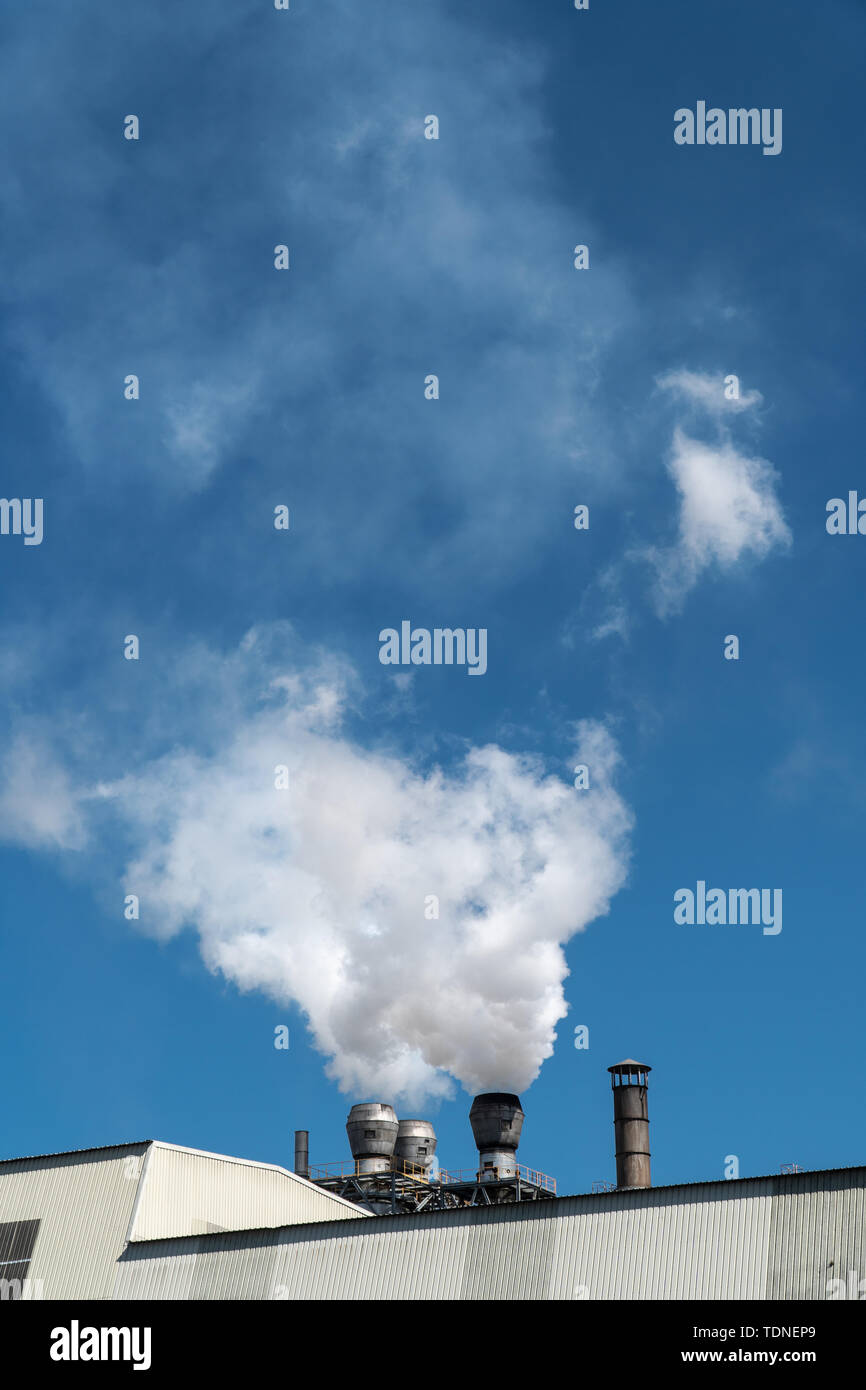 Smoke from industrial chimneys pipes hi-res stock photography and ...