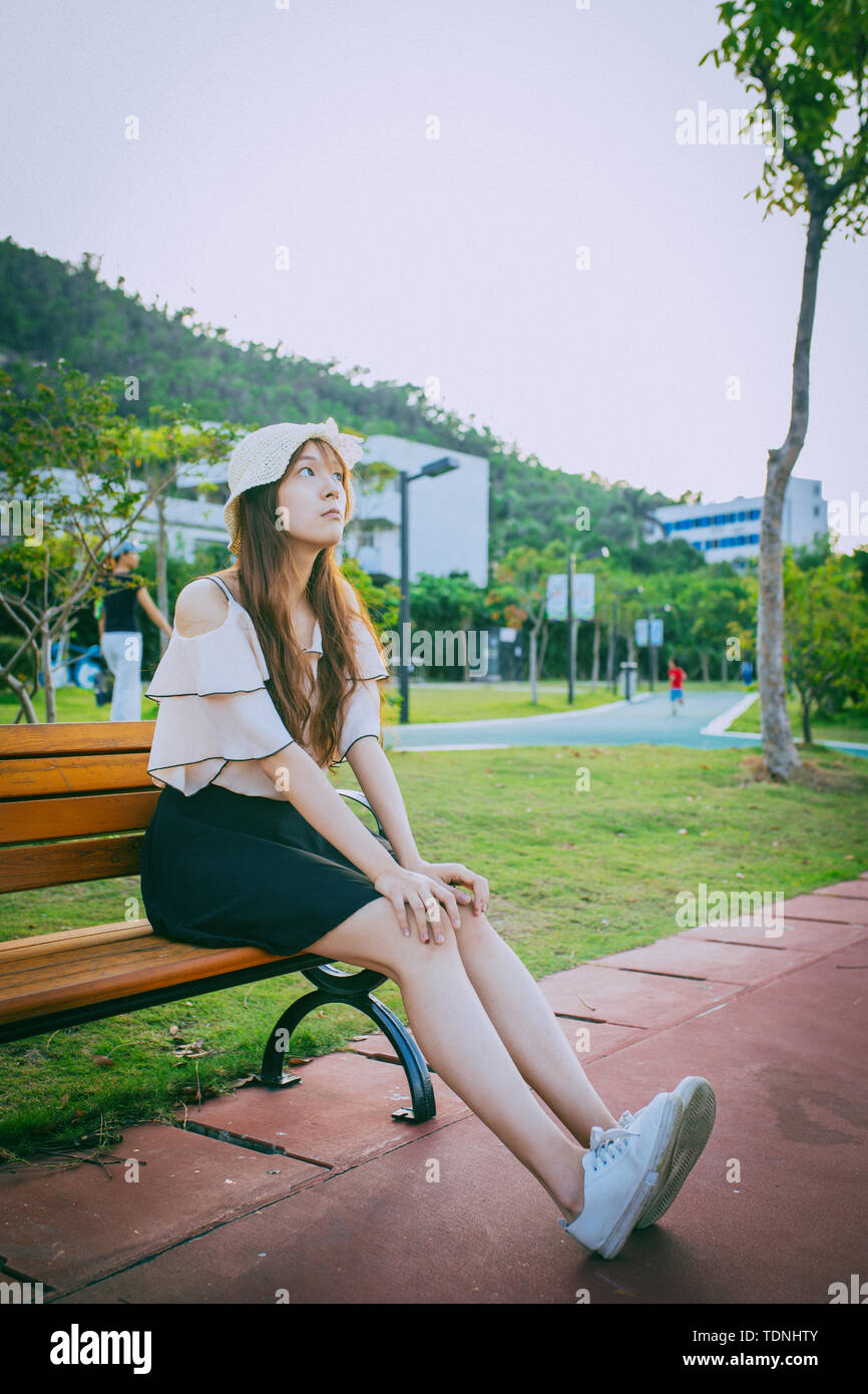 The girl on the bench Stock Photo - Alamy