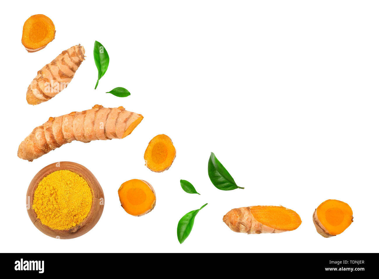 Turmeric powder and turmeric root isolated on white background with ...