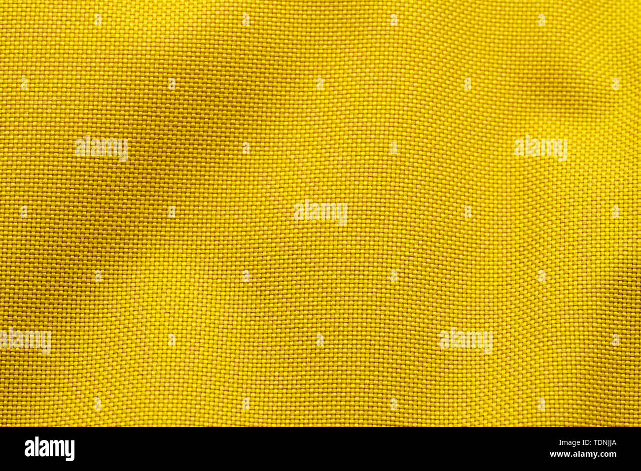 Yellow Nylon Fabric Texture Background. Thick Fabric for Backpacks and ...