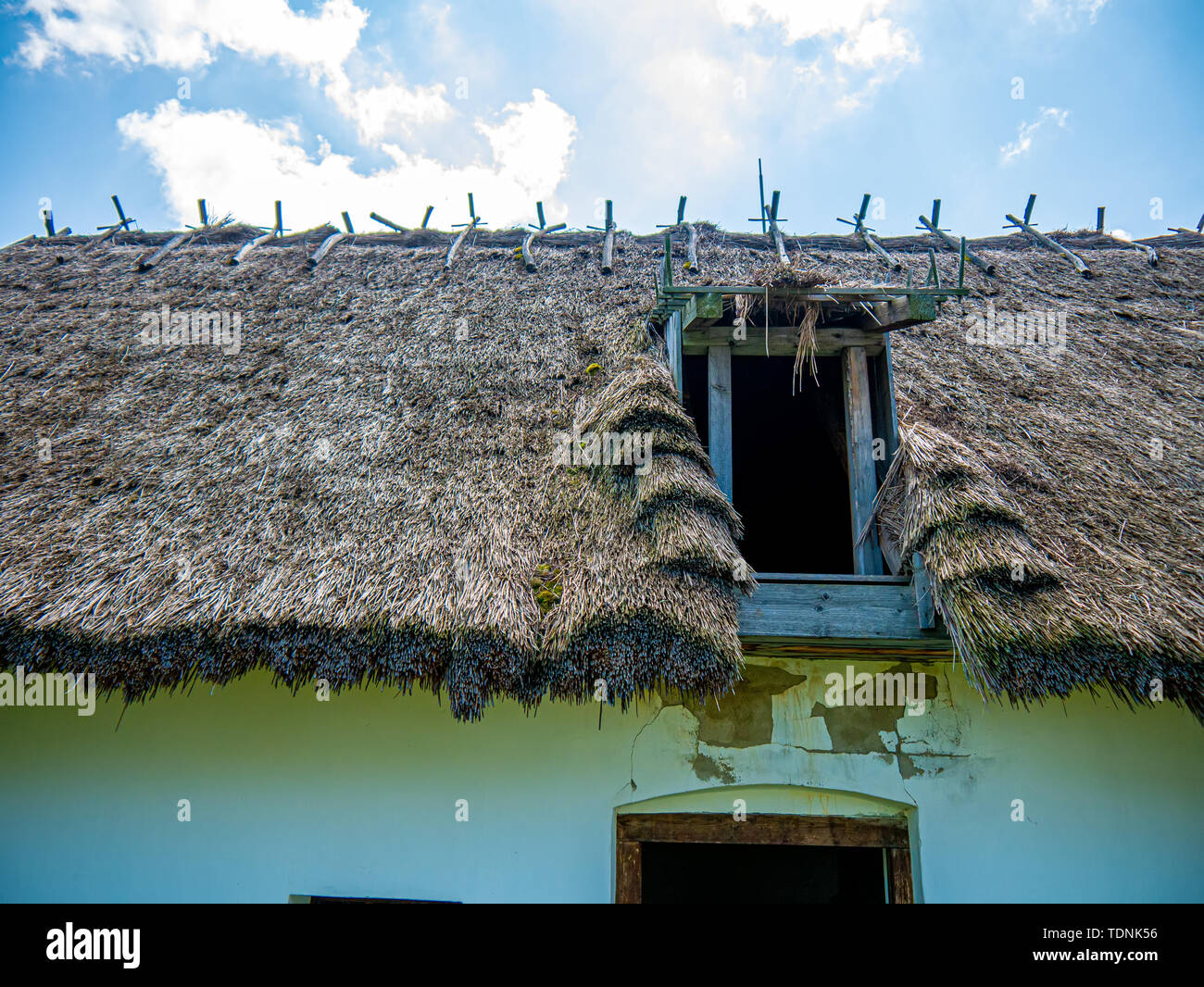View on the tatched roof of a traditional hungarian pise house in ...