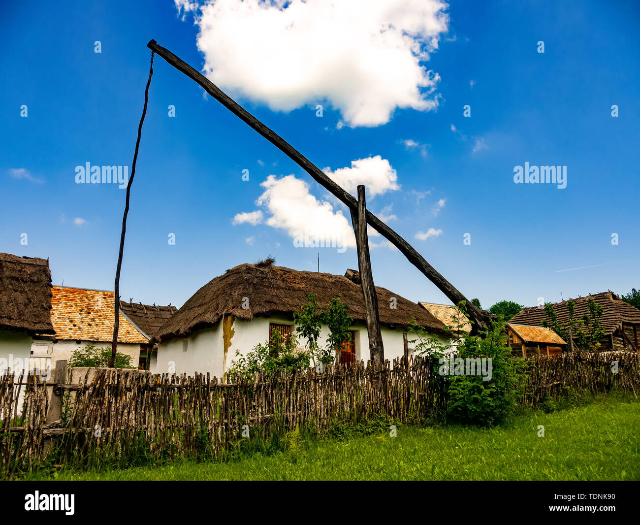 View on a traditional well and hungarian pise houses in Szentendre ...