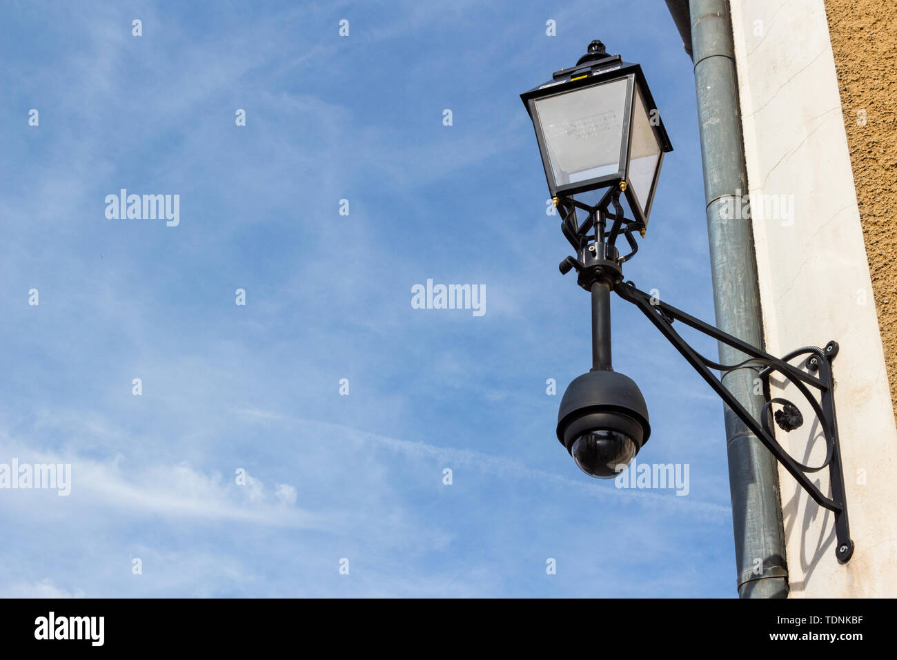 CCTV camera fixed on historic style street lamp Stock Photo - Alamy