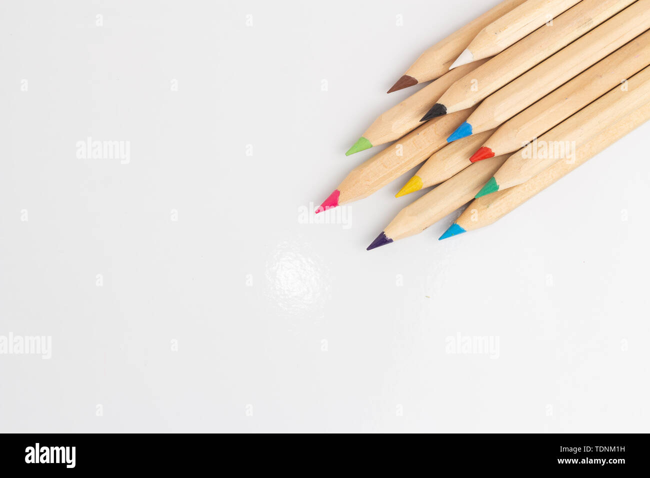 Color pencils are on the white table. Pencil drawing Stock Photo - Alamy
