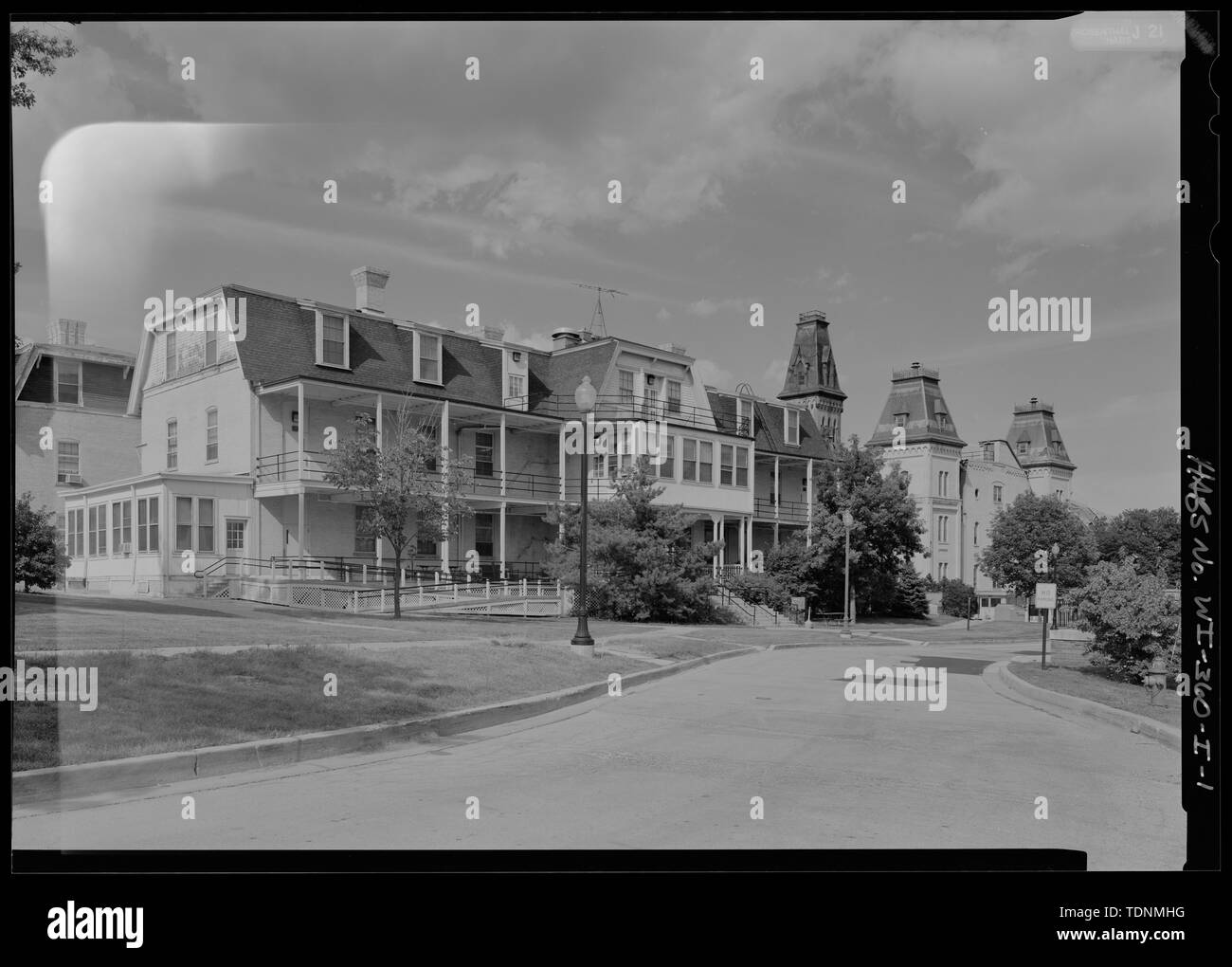 Perspective view from southwest of barracks (Building No. 5). This ...