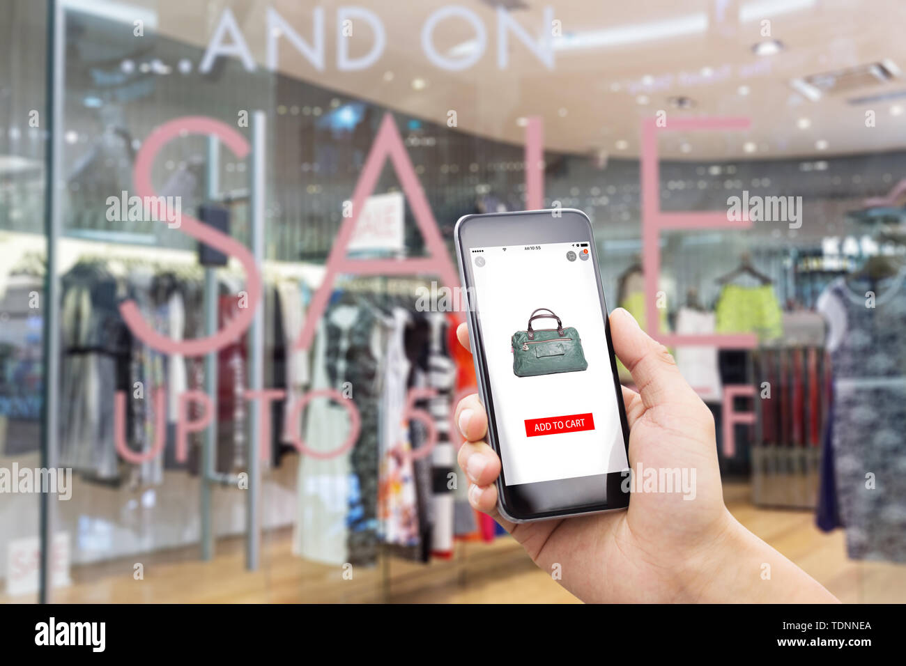 Mobile phone with sign of sale Stock Photo - Alamy