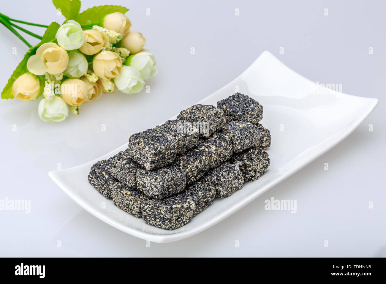 Black sesame cake Stock Photo - Alamy