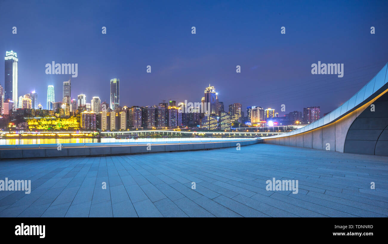 night scene of chongqing from empty brick floor Stock Photo - Alamy
