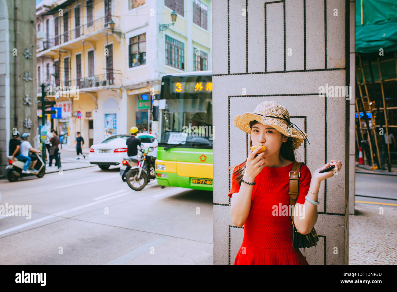 Red dress to Macau Stock Photo - Alamy