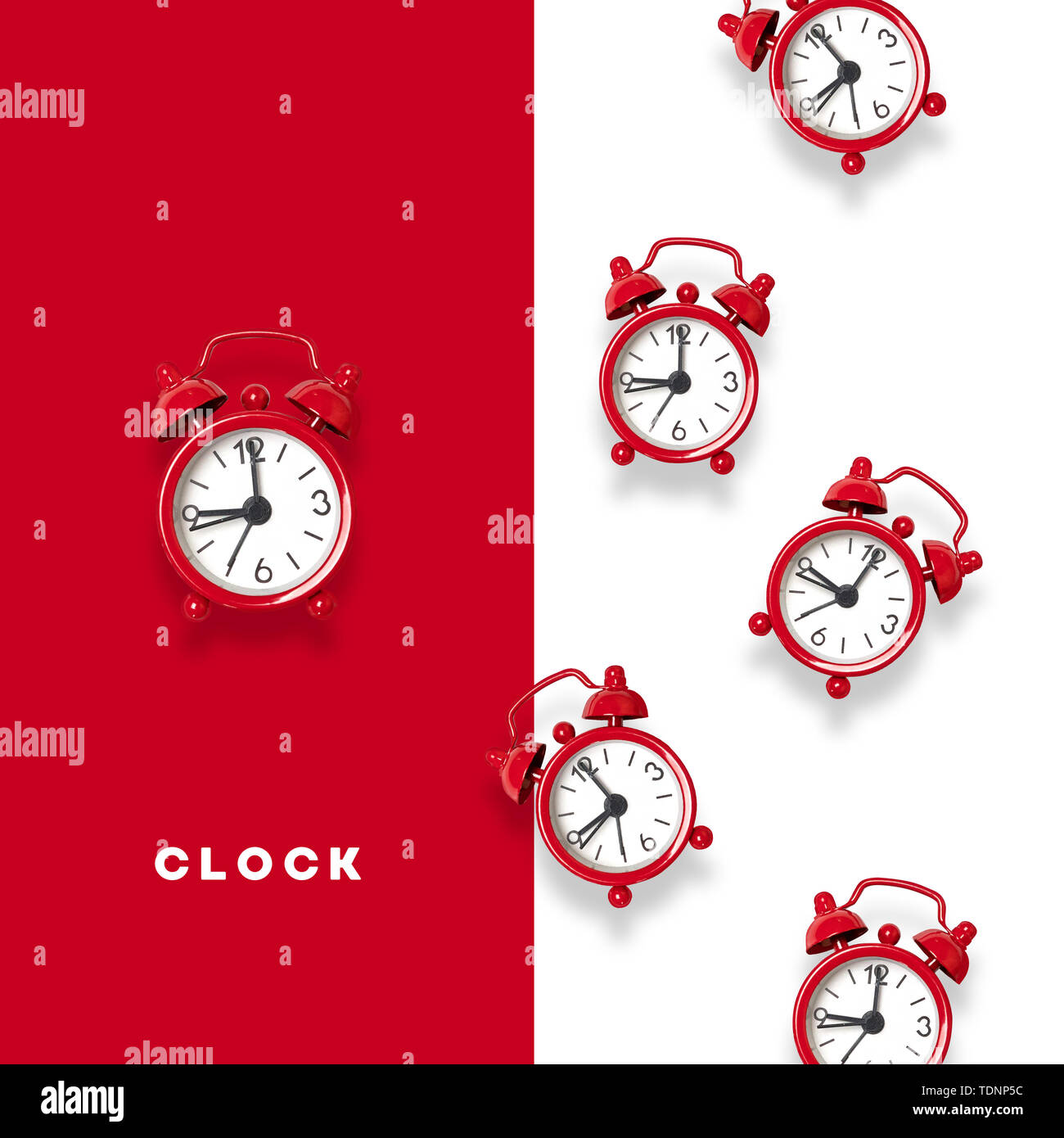 Creative layout made of red alarm clocks and a pattern of alarm clocks ...