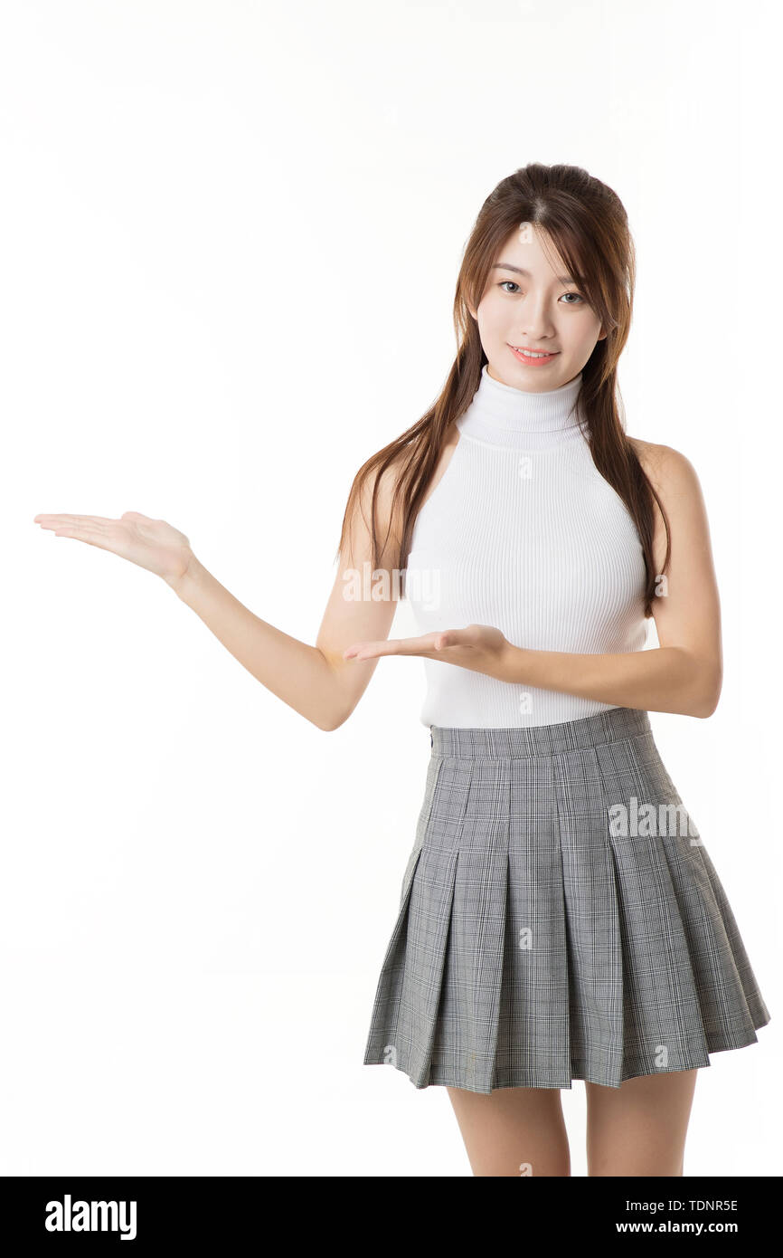 Beautiful cute college student against white background Stock Photo - Alamy