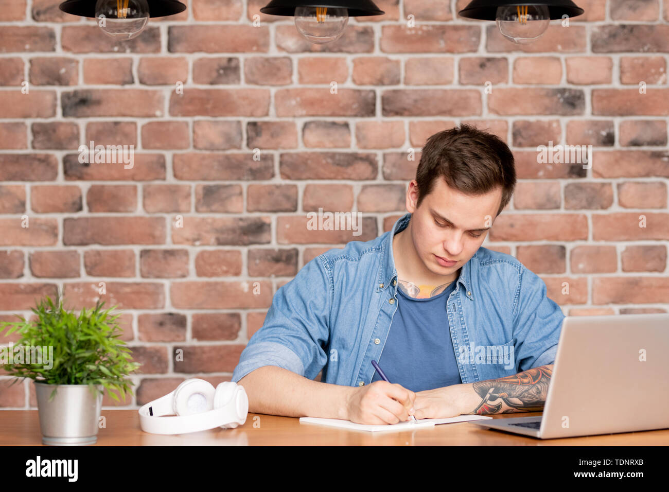 Freelancer working in cafe doing hi-res stock photography and images ...