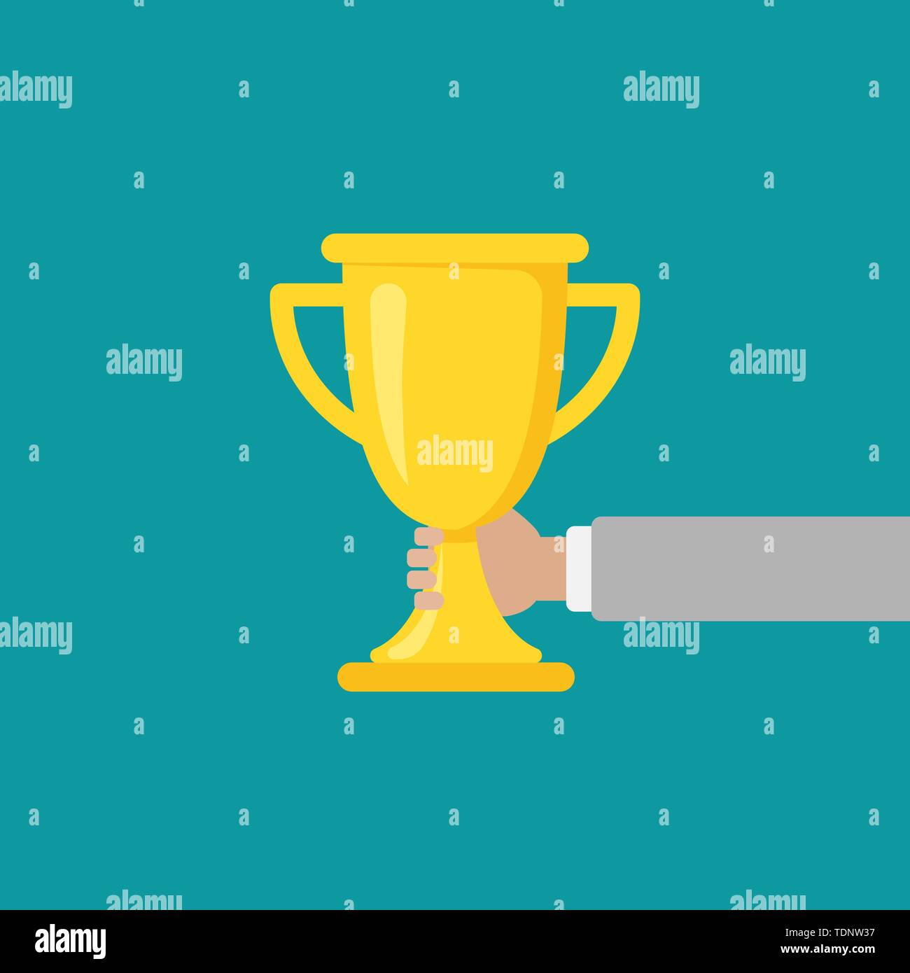 Hand with gold trophy, winning cup isolated on blue background. First ...