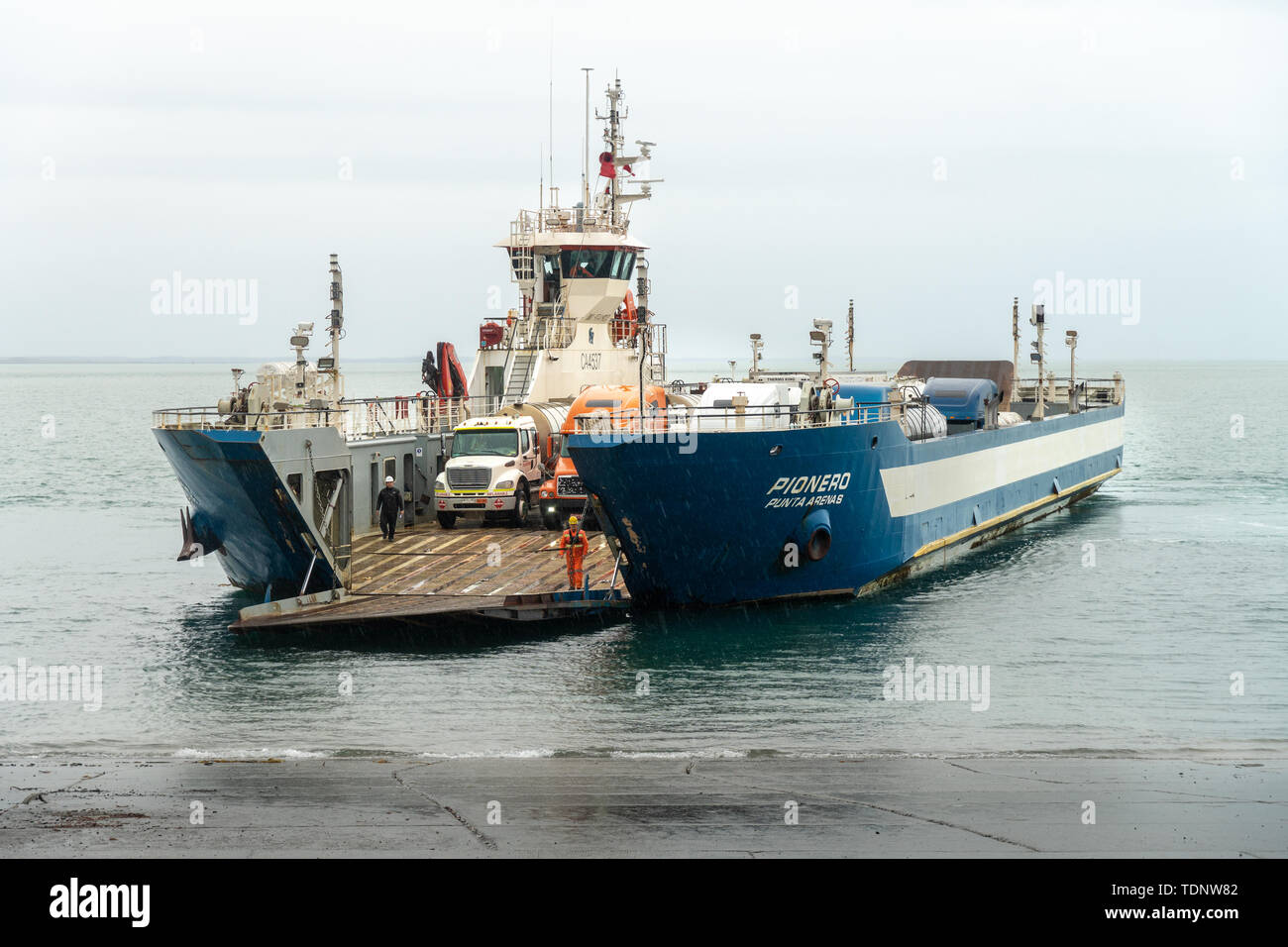 Large Transport Ship carrying Large Trucks and people Stock Photo - Alamy