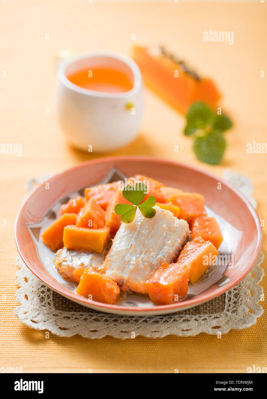 Papaya burning fish Stock Photo - Alamy