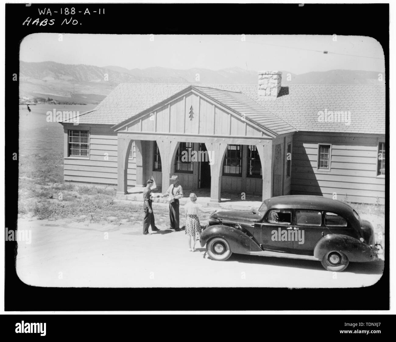 Photocopy of a color slide (showing Ranger Robert Doorw ourside the ...