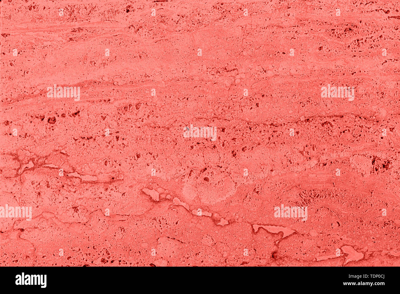 Closeup of trendy coral colored porous stone textured wall. Abstract ...