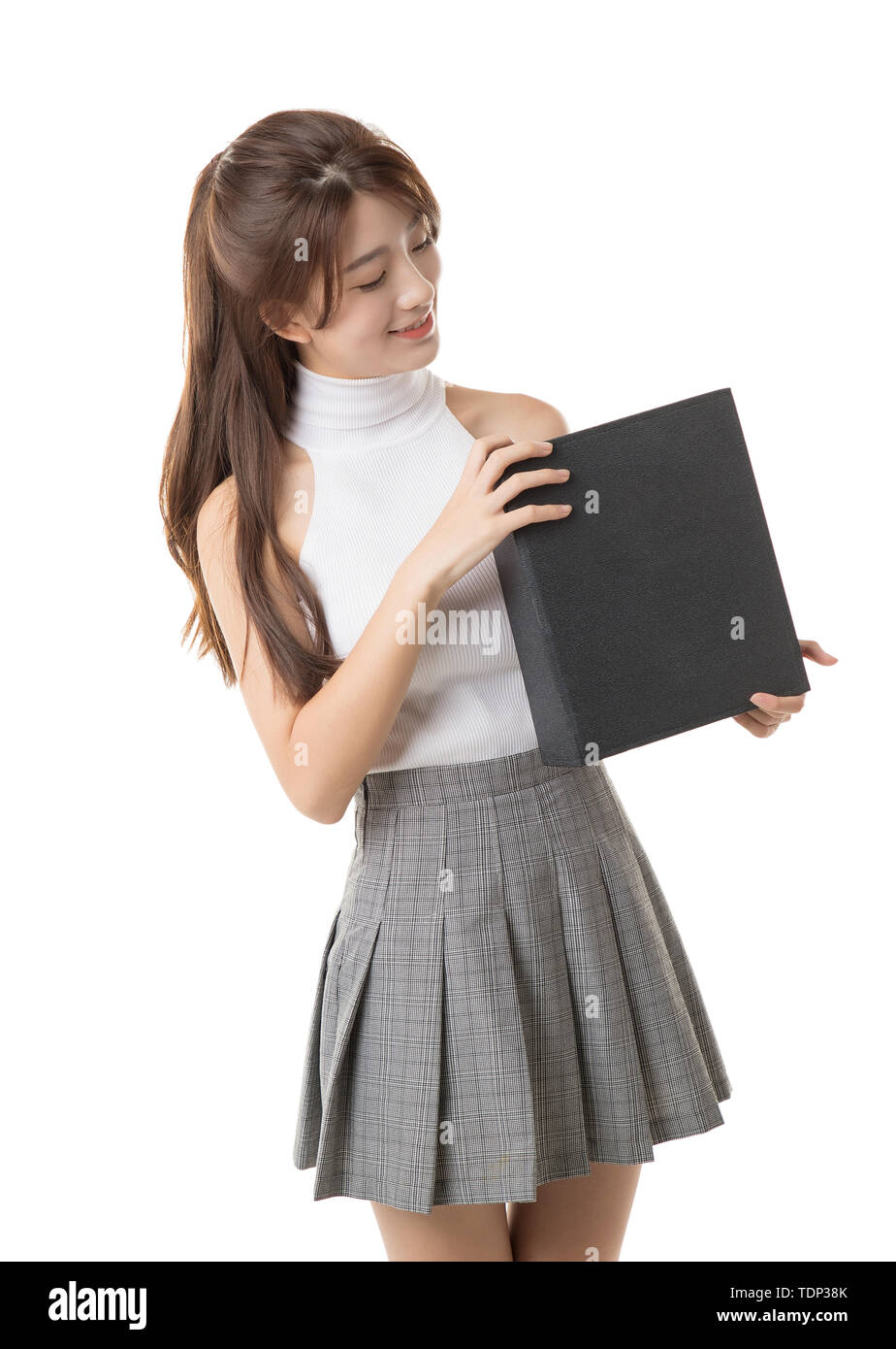 Beautiful cute college student against white background Stock Photo - Alamy