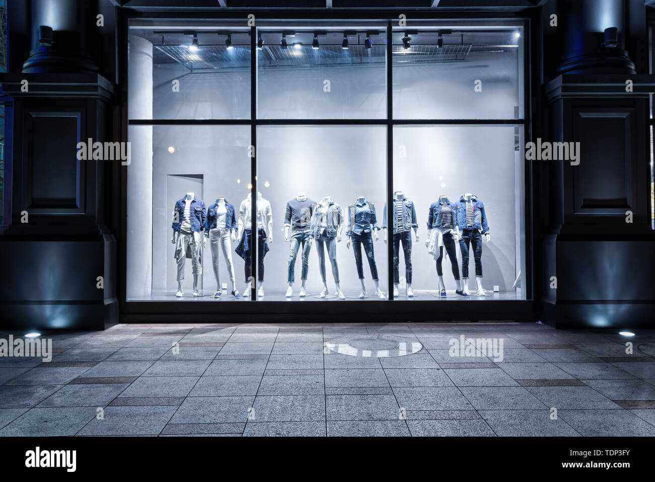 fashion shop display window and clothes Stock Photo - Alamy