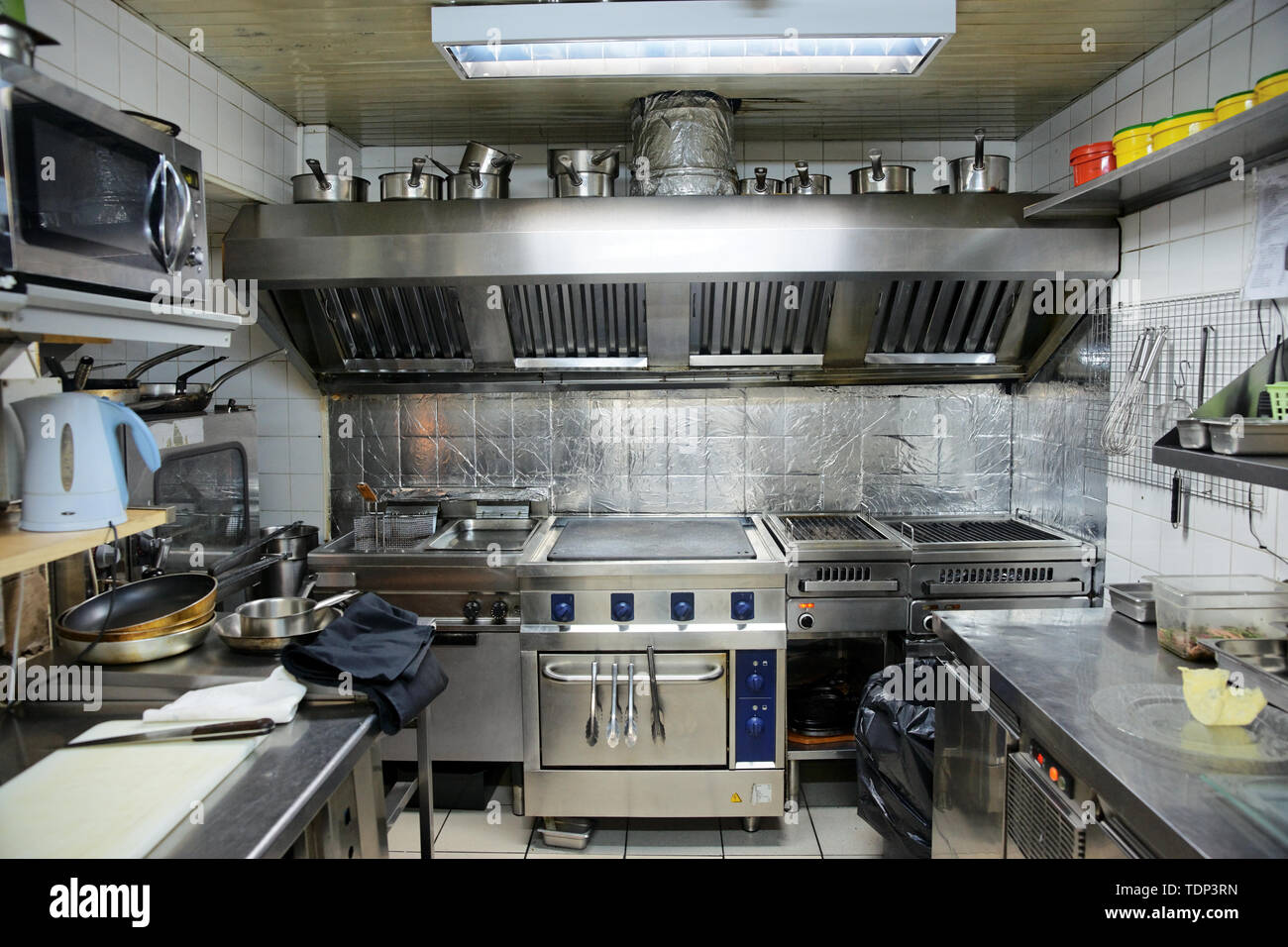 Typical kitchen of a restaurant shot in operation Stock Photo - Alamy