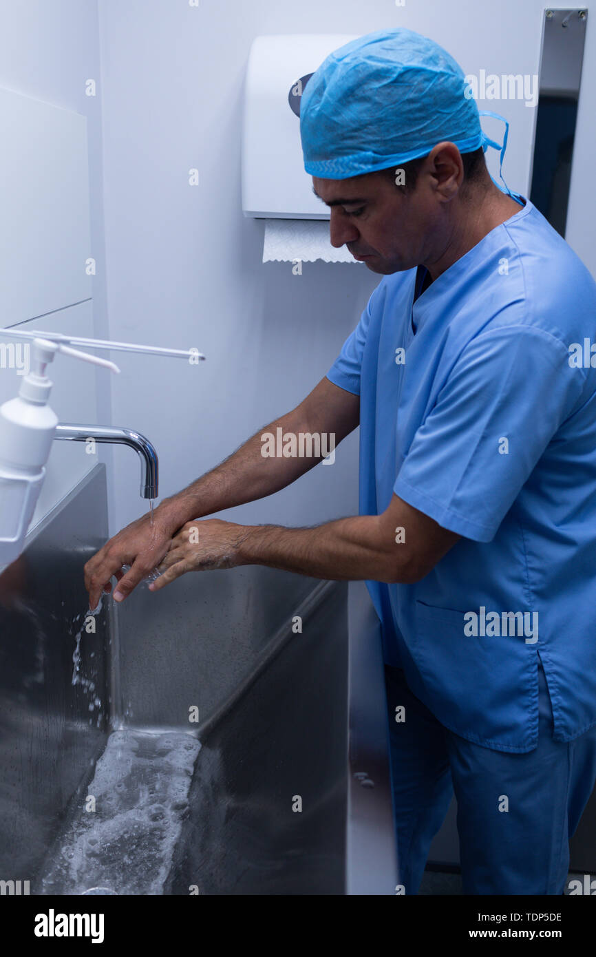 Male surgeon washing hands in sink at hospital Stock Photo - Alamy