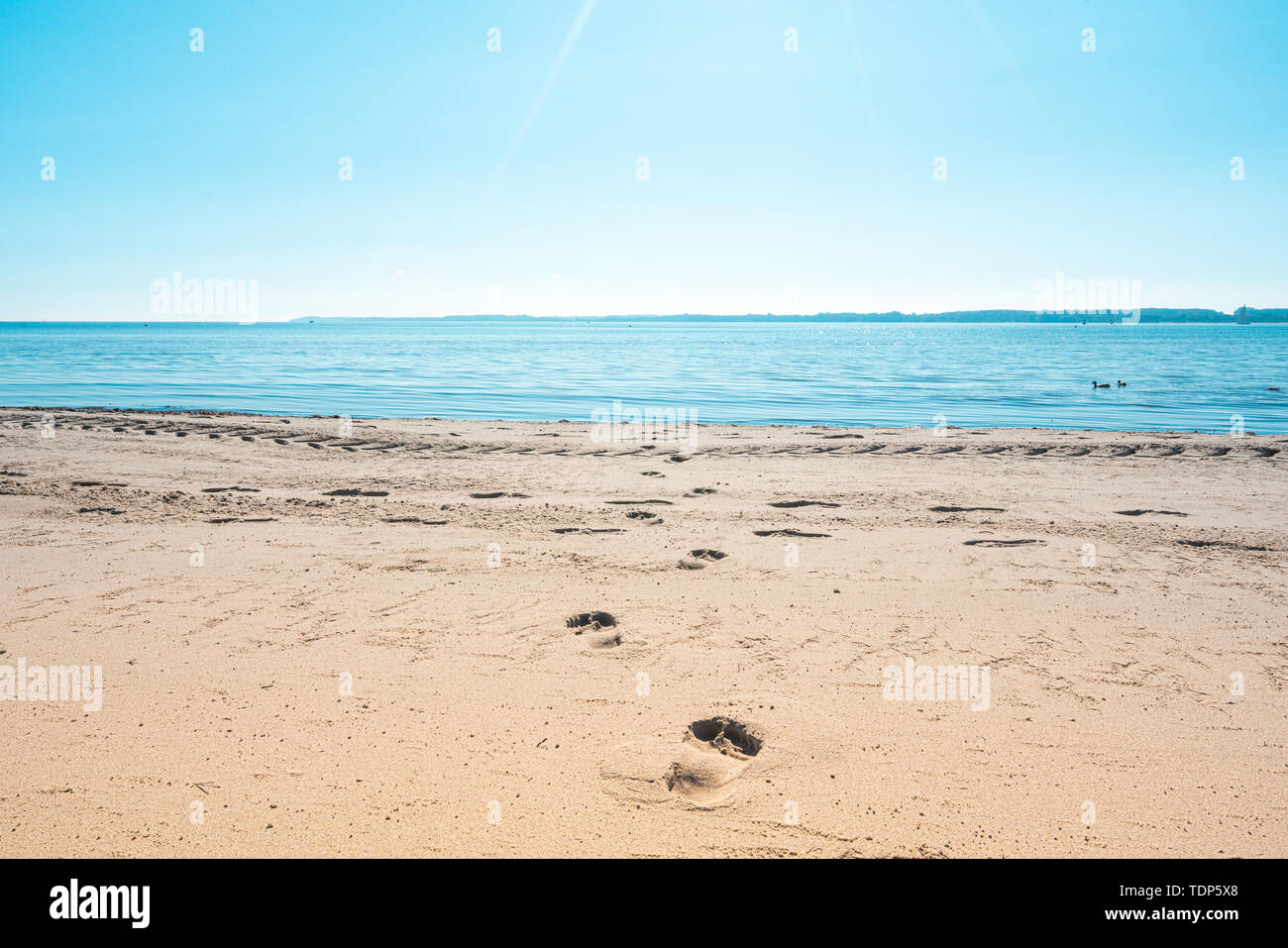 a photo of the beach in beautiful weather Stock Photo - Alamy