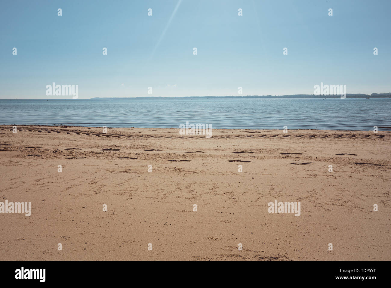 a photo of the beach in beautiful weather Stock Photo - Alamy