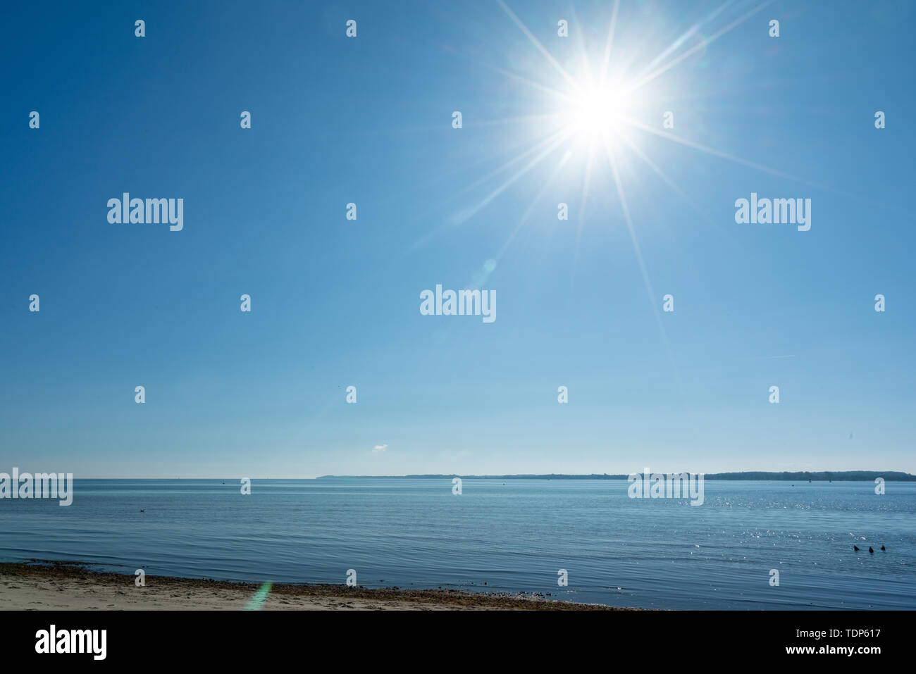 a photo of the beach in beautiful weather Stock Photo - Alamy