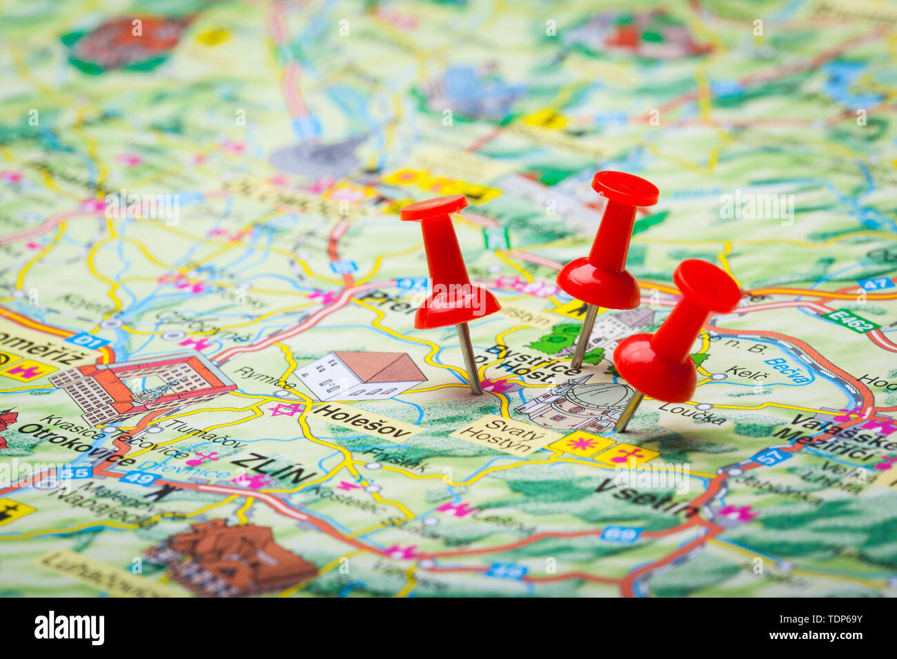 Travel destination points on a map indicated with colorful thumbtacks ...