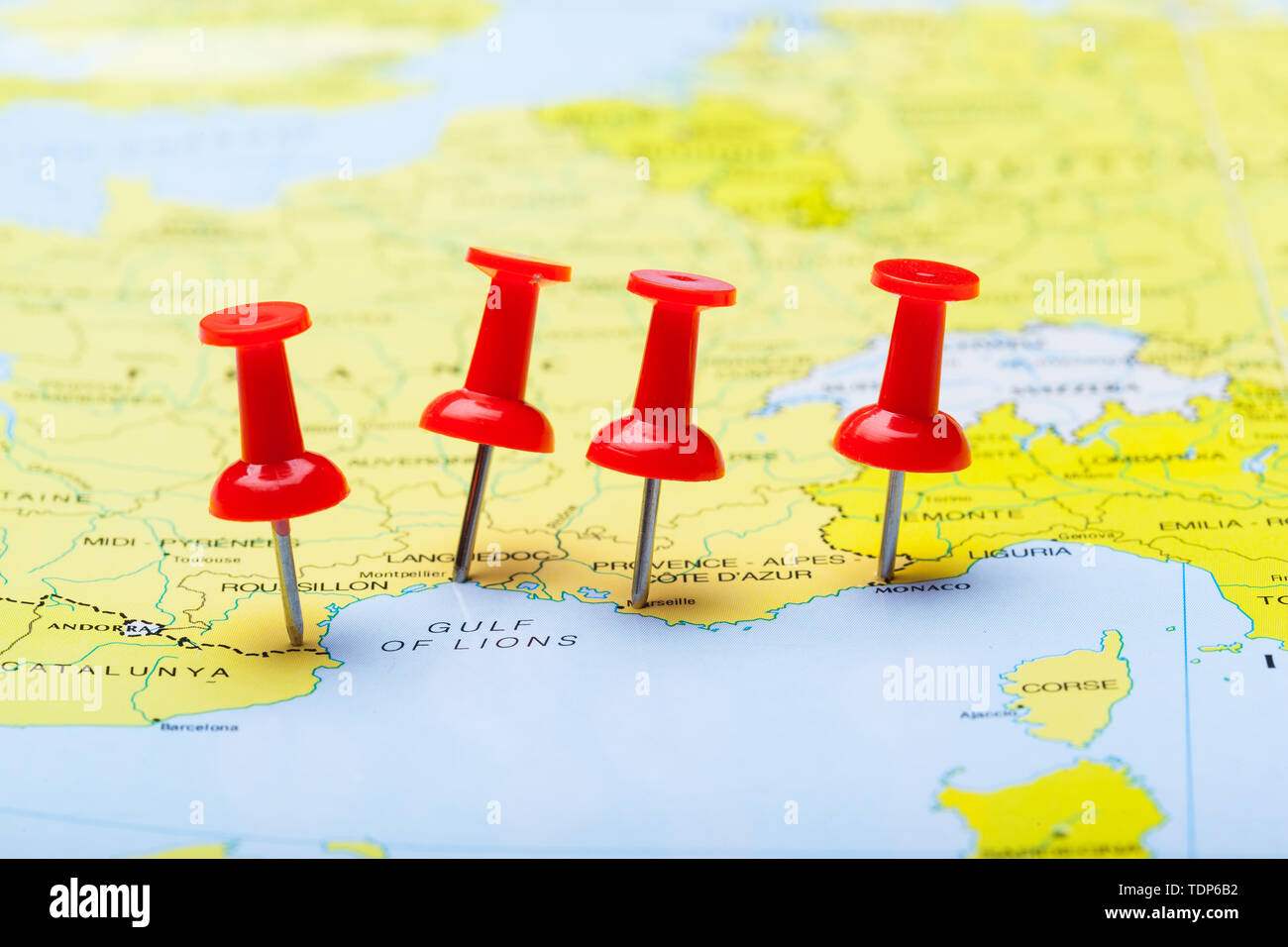 Travel destination points on a map indicated with colorful thumbtacks ...