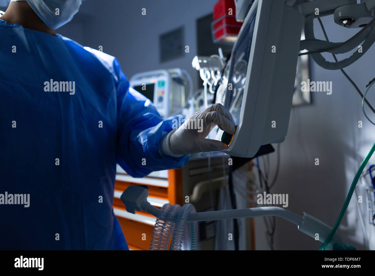Female surgeon using monitor in operation theater at hospital Stock ...
