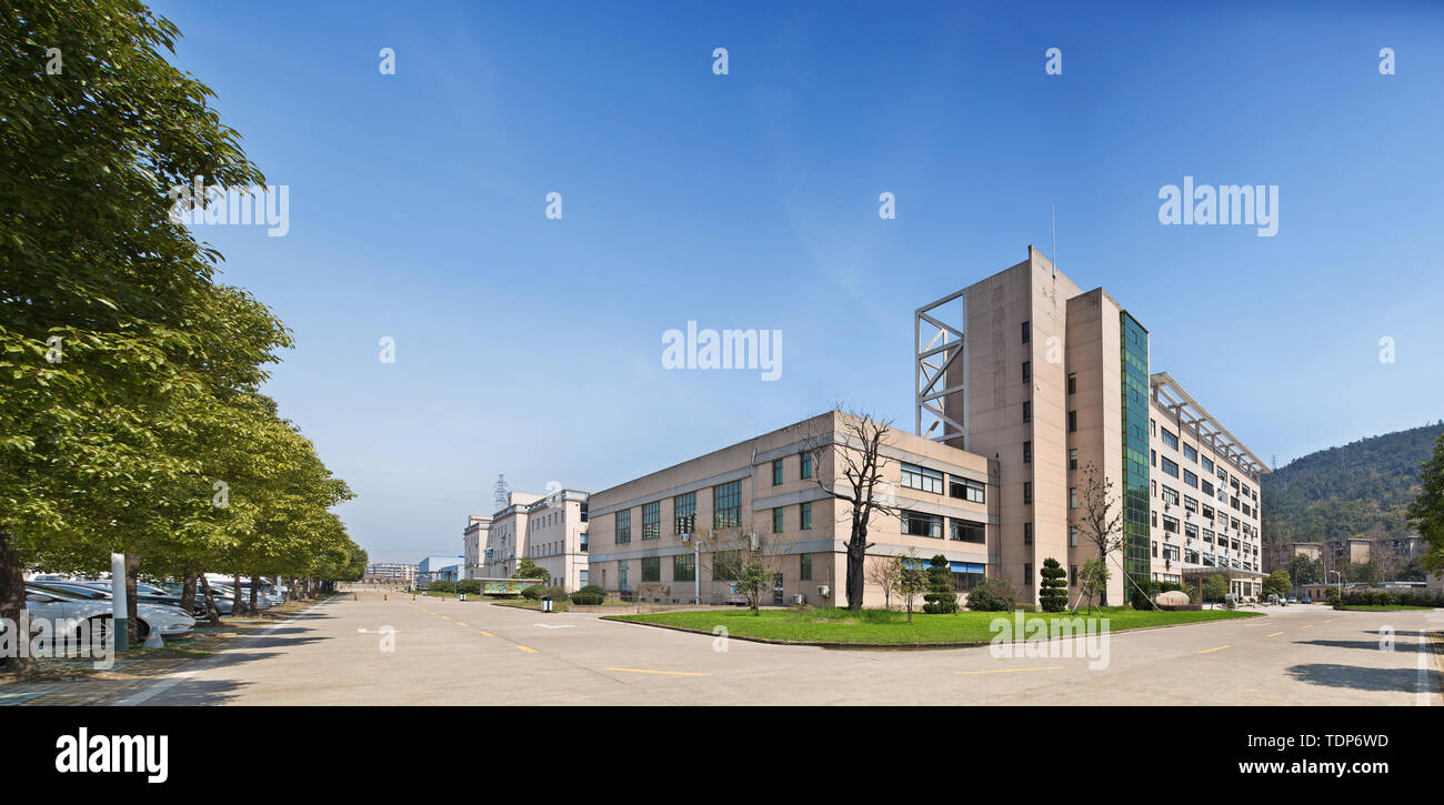 Side view on the office building with parking lot Stock Photo - Alamy
