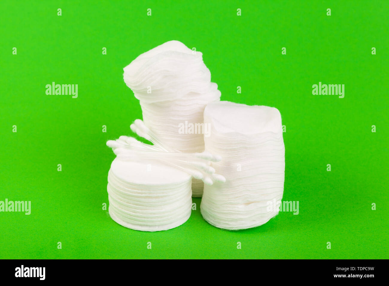 cotton pads stack on colored background Stock Photo - Alamy