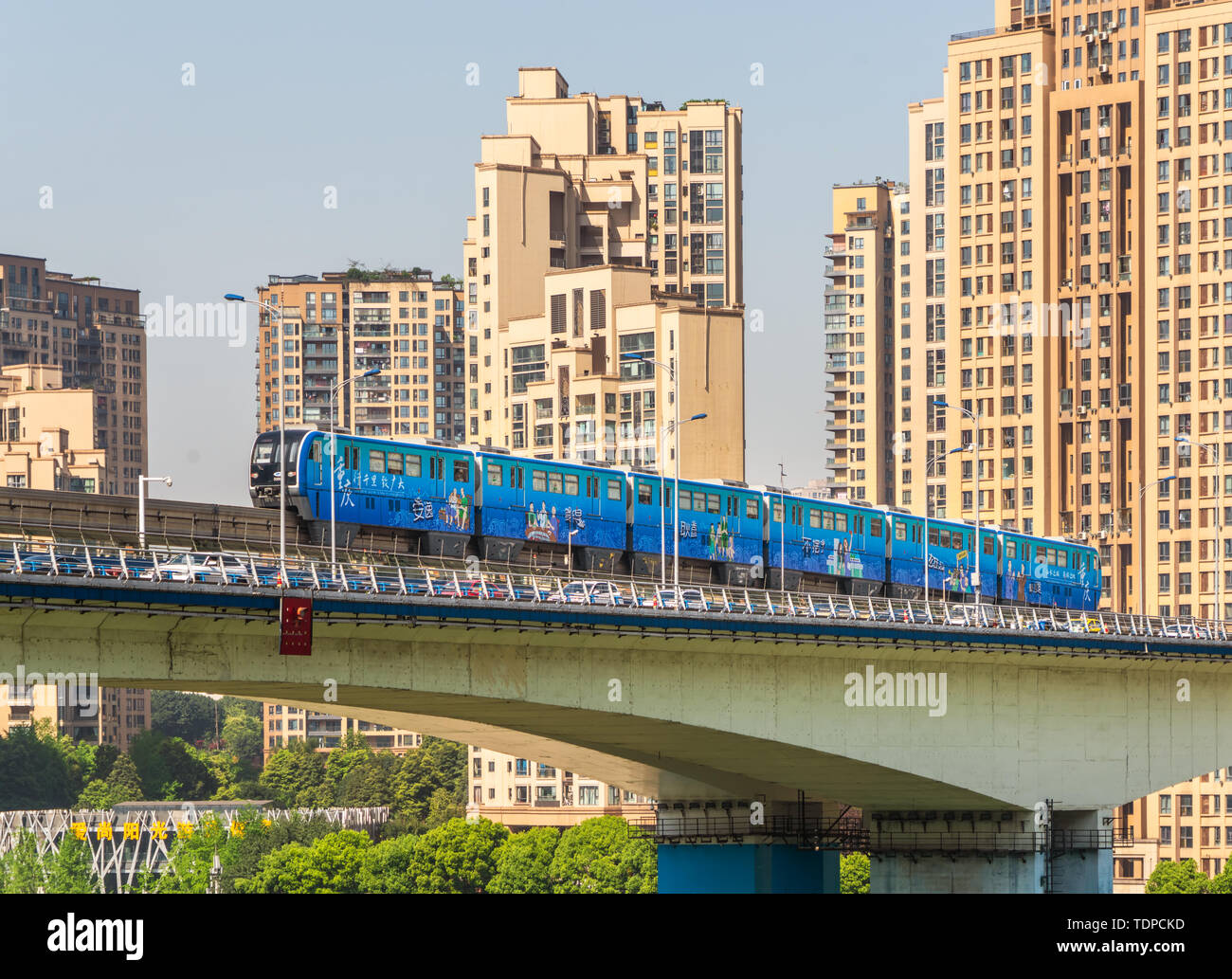 Chongqing light rail train passing the bridge Stock Photo - Alamy