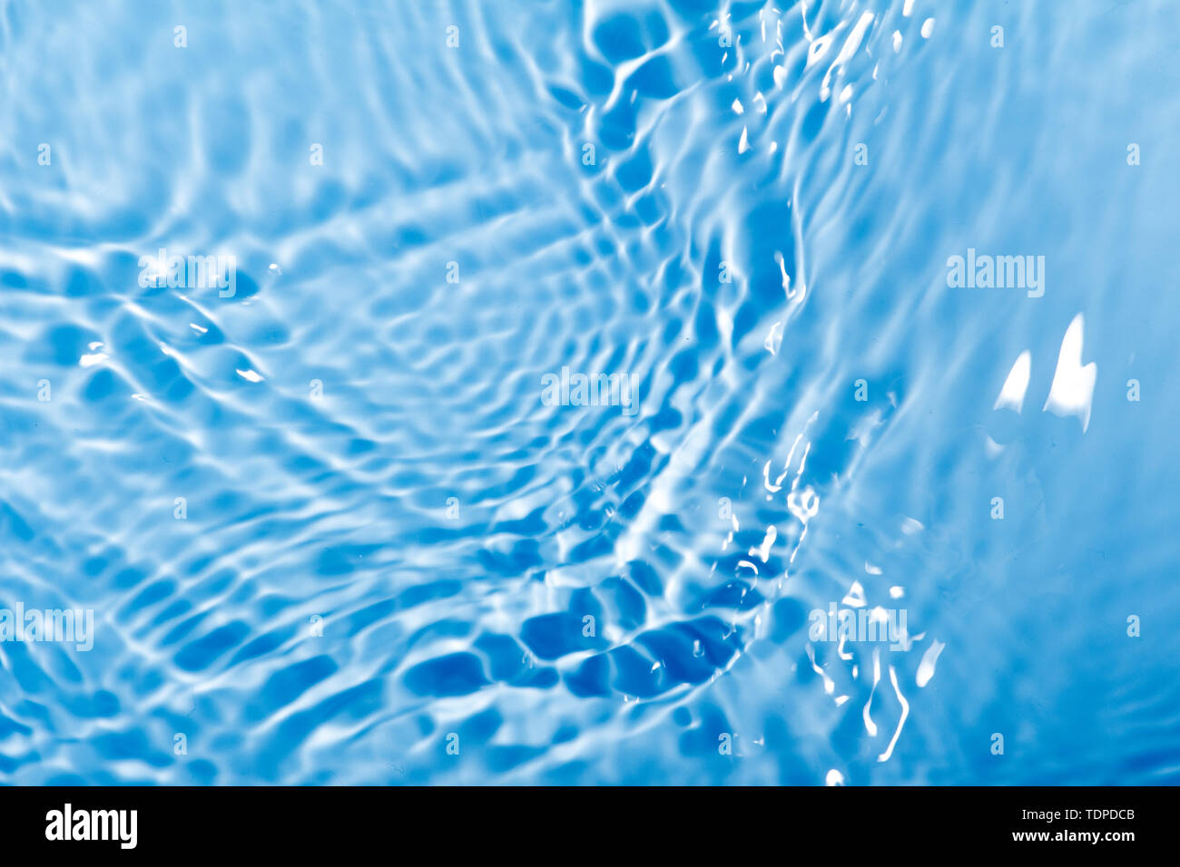 Crystal clear water ripples Stock Photo - Alamy