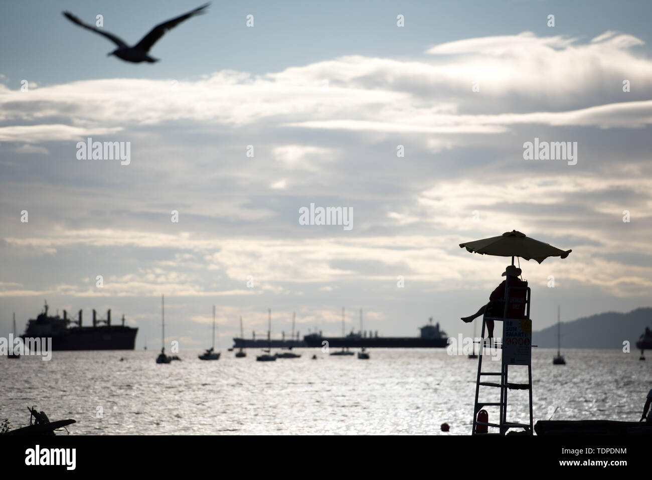 Beach swimming pool lifeguard at sunset Stock Photo - Alamy