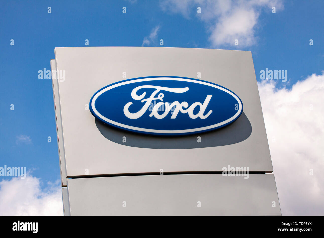 Sign with the logo of Ford Motor Company. American multinational ...