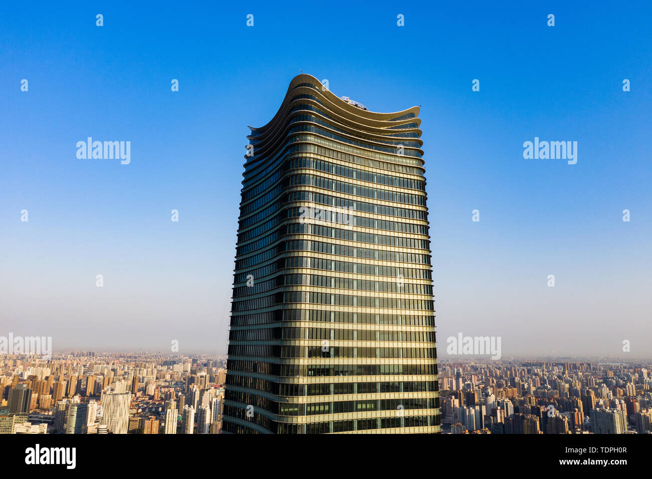 aerial shot of the first high-rise building magnolia building in ...
