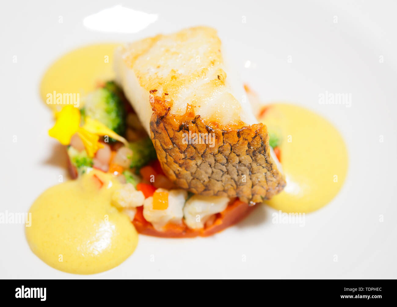 Fried cod fillet with vegetable mix and delicious mousse Stock Photo ...