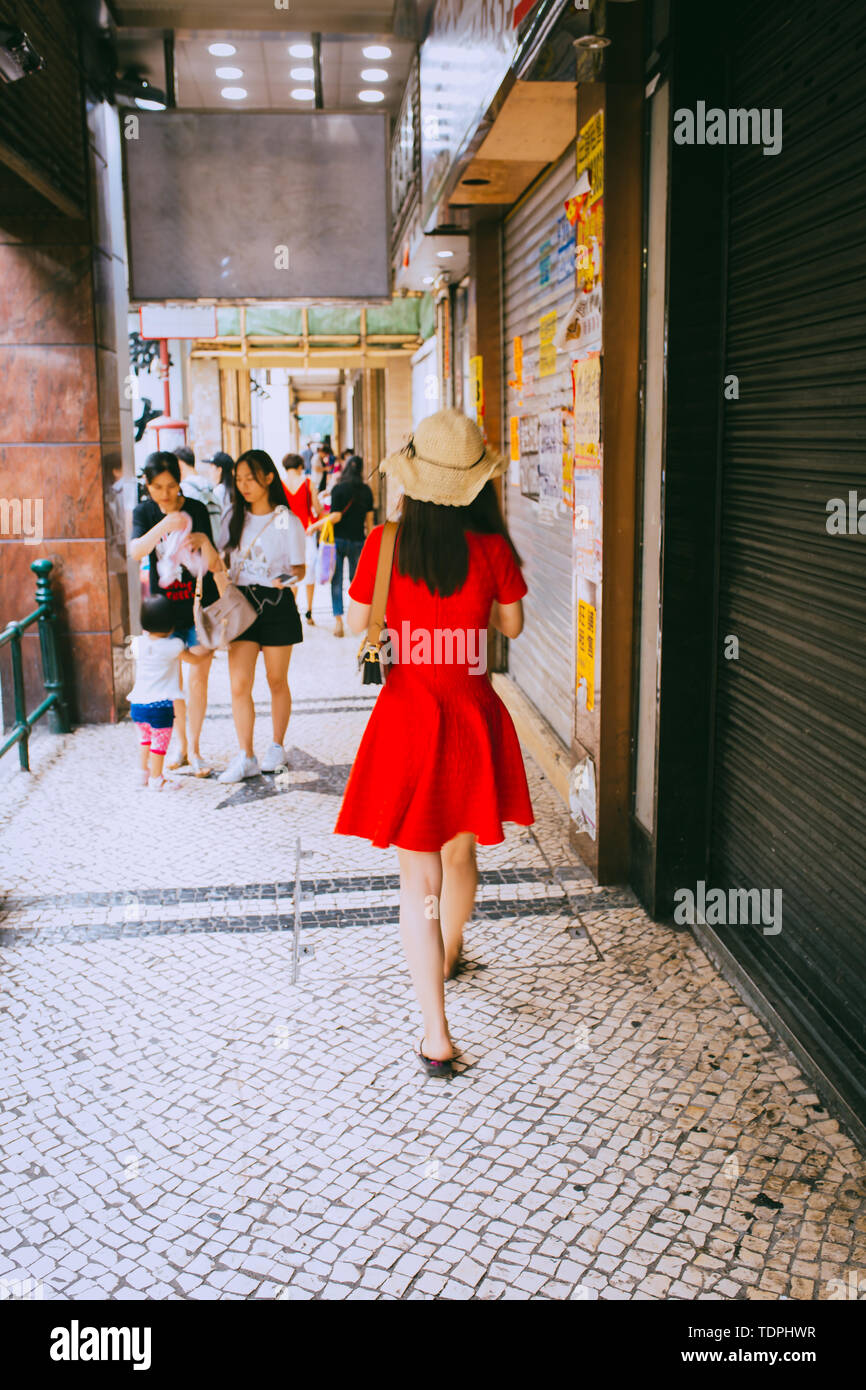 Red dress tour the big three buses Stock Photo - Alamy