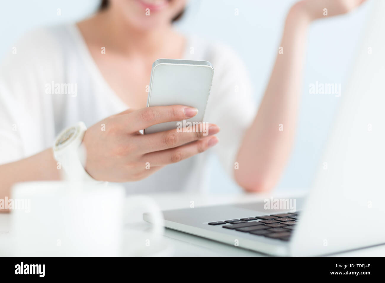 young pretty chinese woman working with laptop in office Stock Photo ...