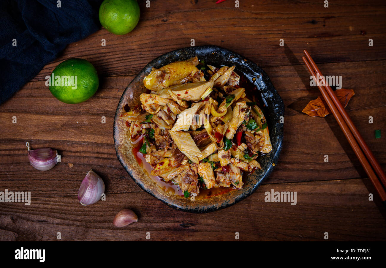 drooling chicken, stick chicken Stock Photo - Alamy