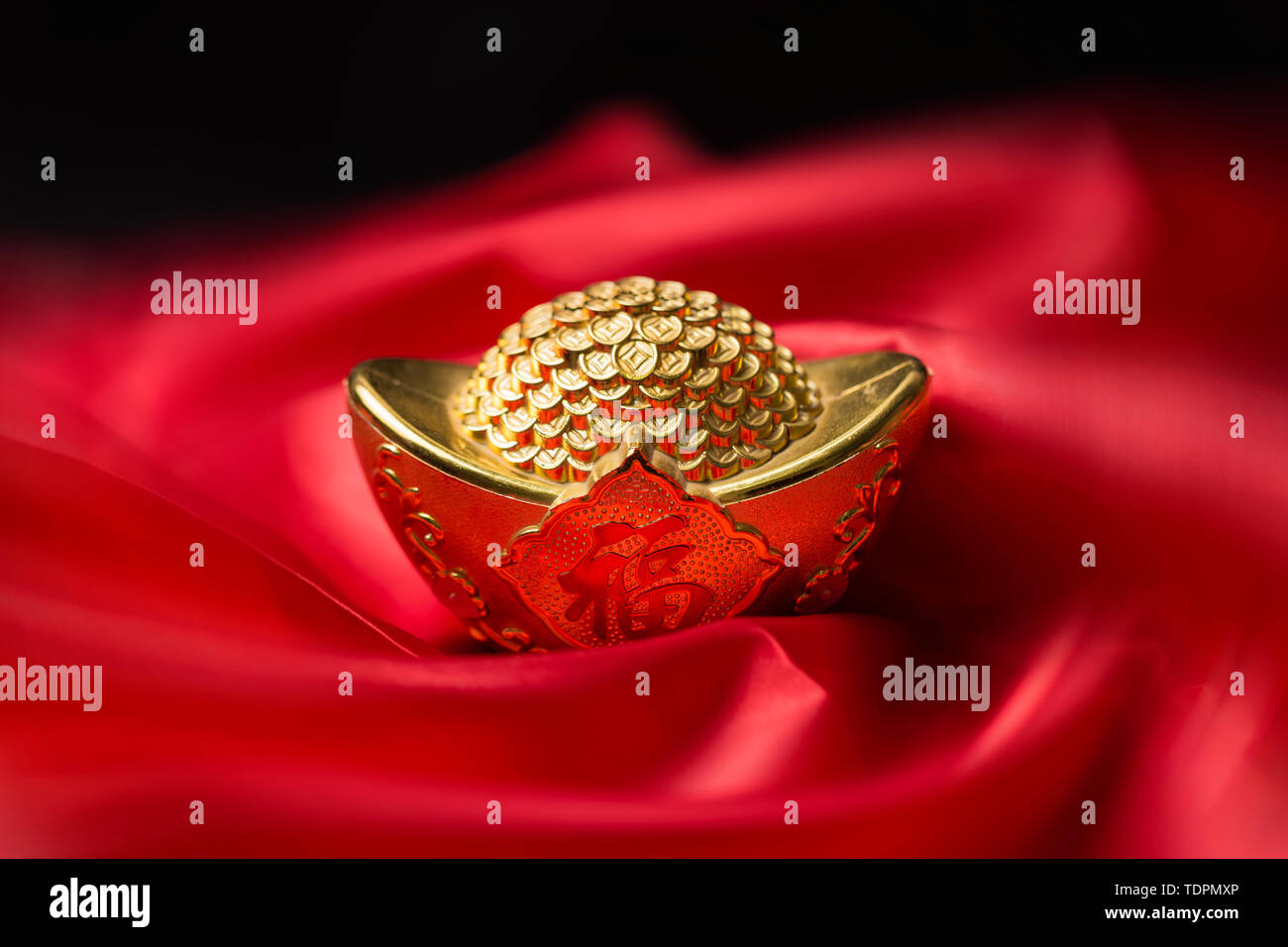 Jin Yuanbao with a blessing written on it Stock Photo - Alamy