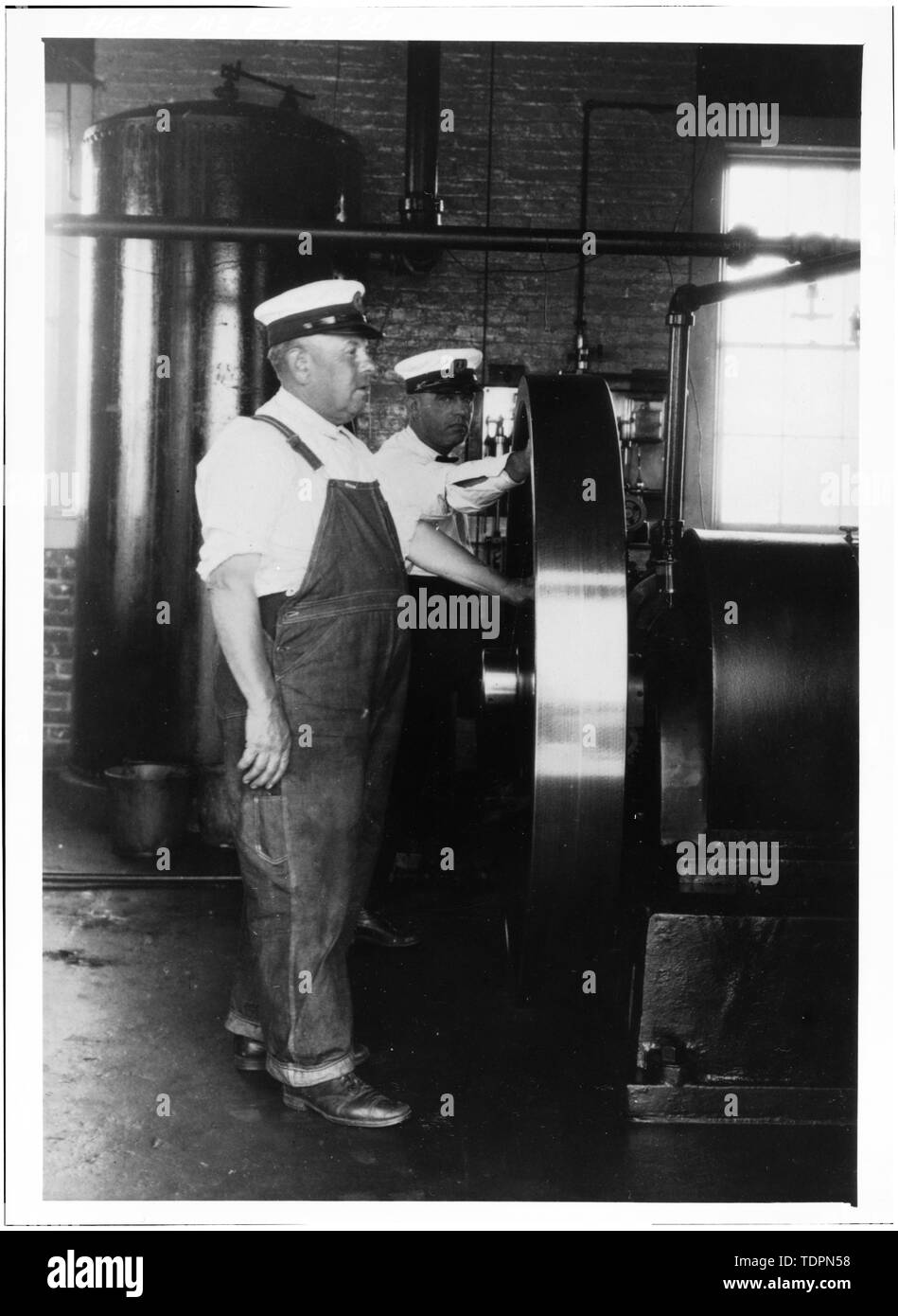 Photograph of interior view of fog horn signal building with two ...