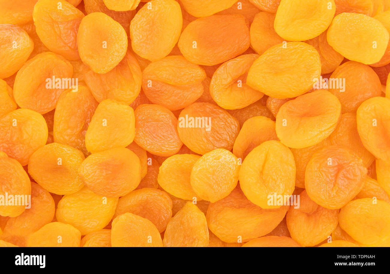 Naturally dried apricots. Food background or texture Stock Photo - Alamy