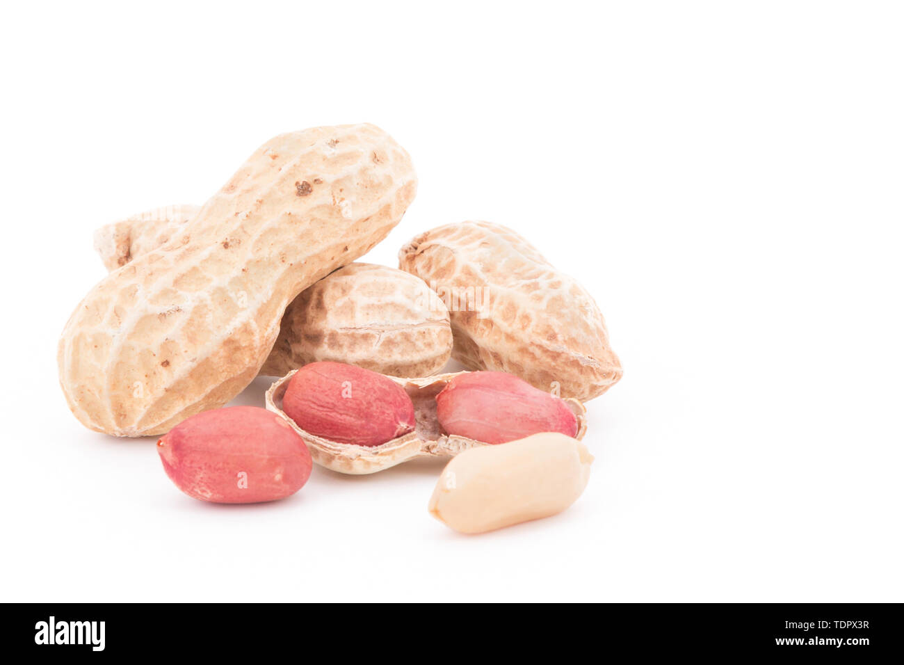 Peanuts on white background Stock Photo - Alamy