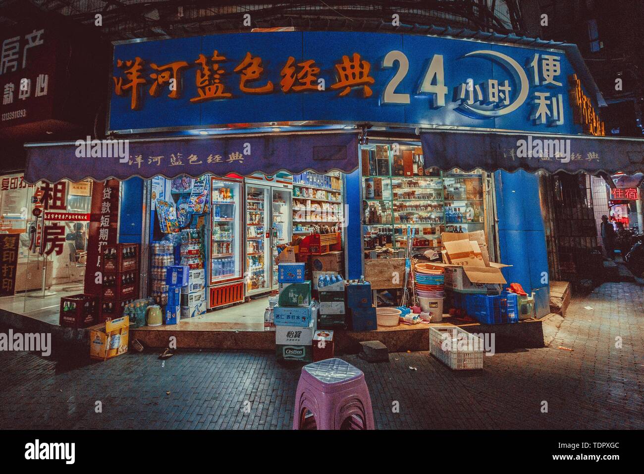 At night, shops in the old town Stock Photo - Alamy