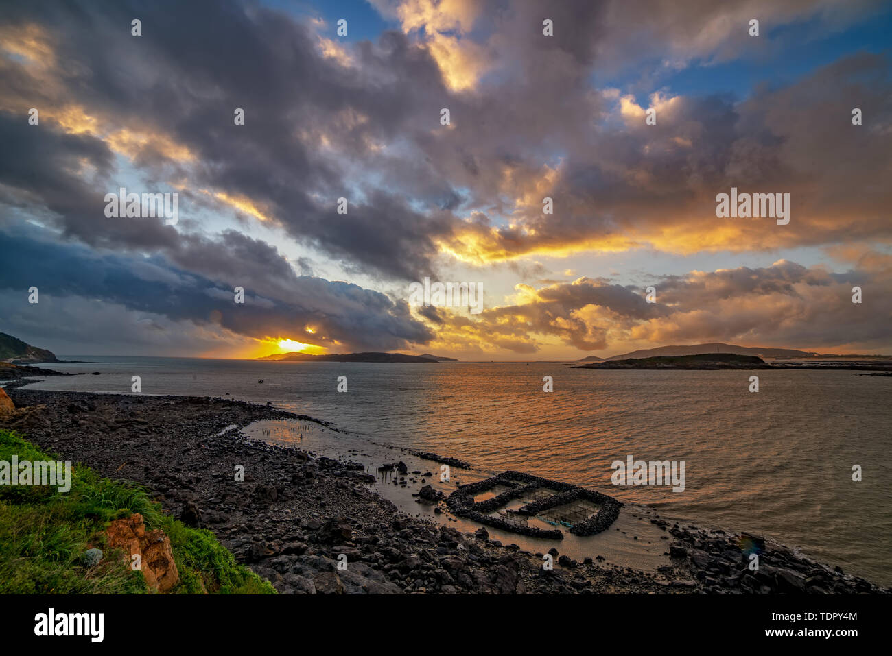 Sea sunrise in Beigang fishing village Stock Photo - Alamy
