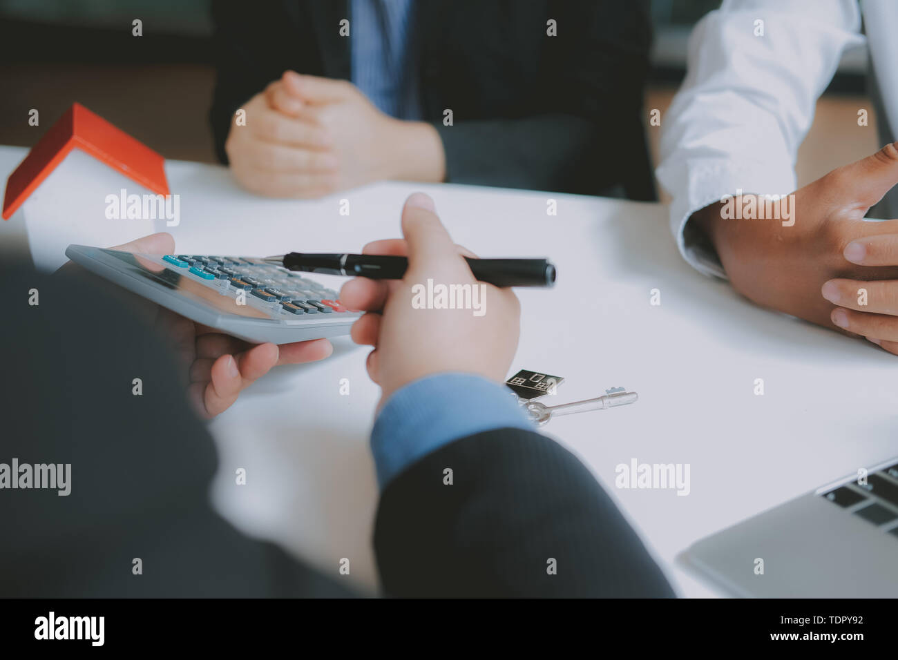 lawyer insurance broker consulting giving legal advice to couple ...